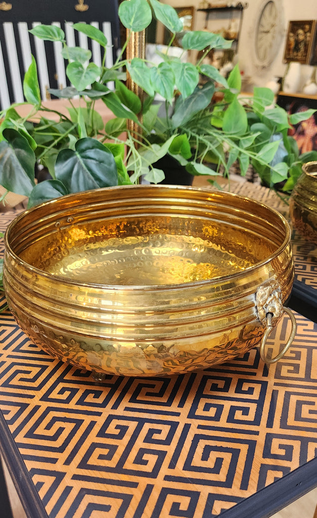 Hammered brass, lion head handle bowl with feet. – Mishique Design