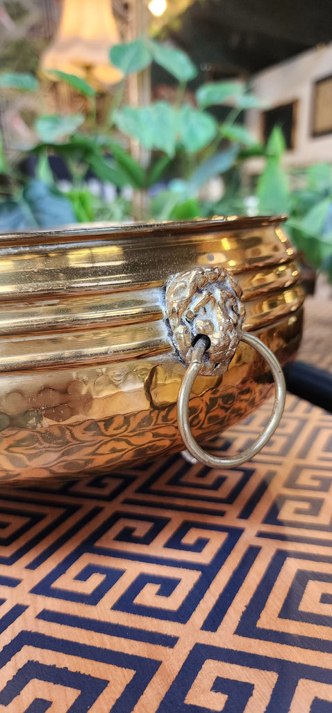 Hammered brass, lion head handle bowl with feet. – Mishique Design